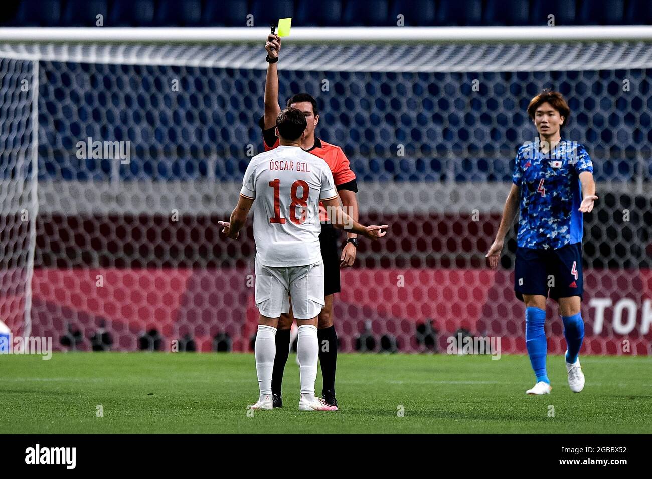 SAITAMA, JAPAN - AUGUST 3: Oscar Gil of Spain receives a yellow card ...