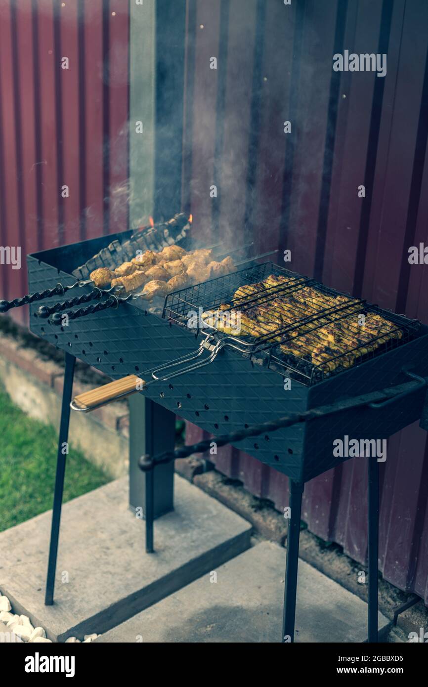 Chicken kebab is cooked on the grill. Grilled meat Stock Photo - Alamy