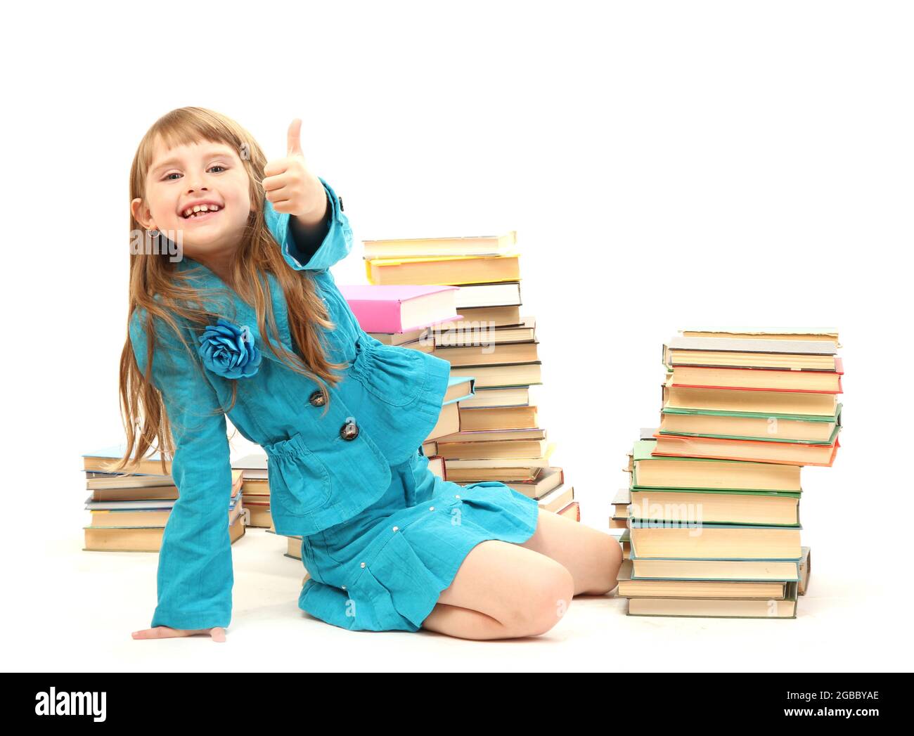 little girl with a books isolated on white Stock Photo - Alamy
