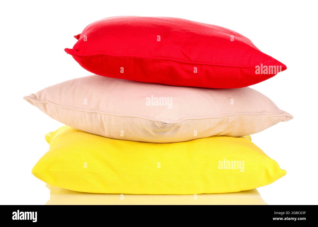 Bright color pillows isolated on white Stock Photo - Alamy