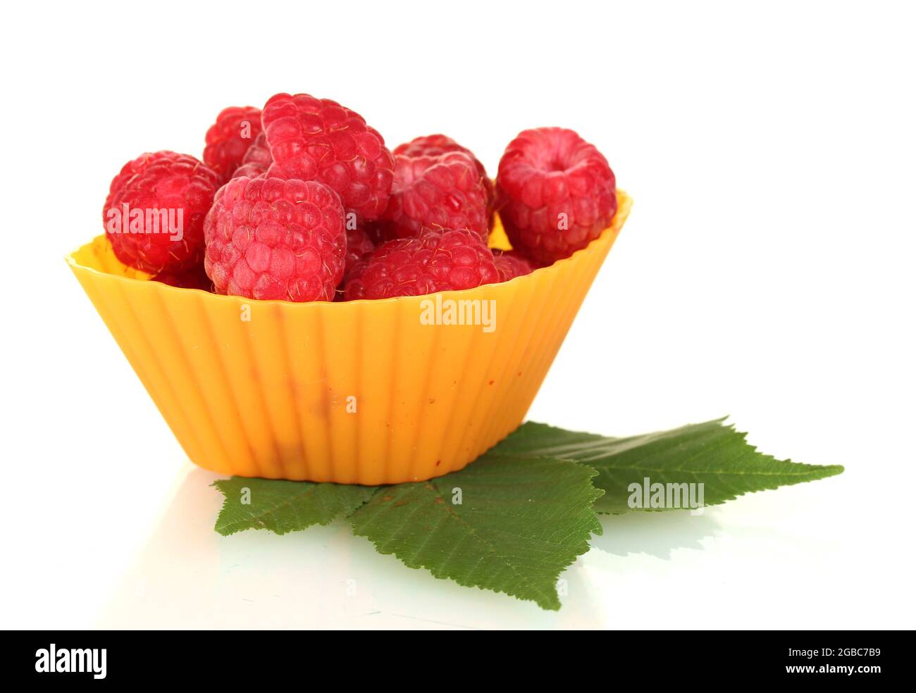 Fresh raspberries in silicone mold isolated on white Stock Photo - Alamy