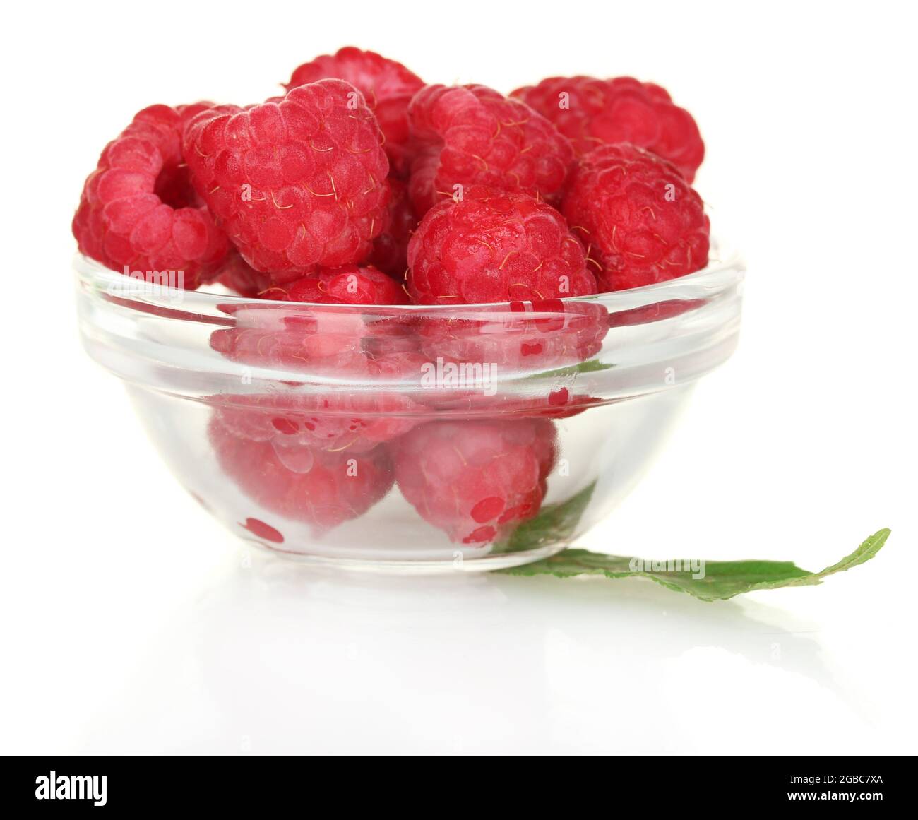 Fresh raspberries in bowl isolated on white Stock Photo - Alamy