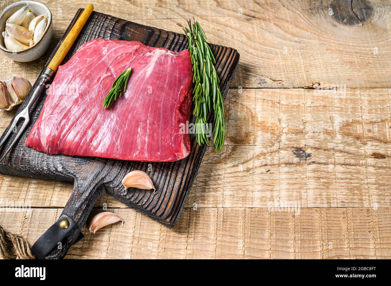 Fresh Raw flank or bavette beef marbled meat steak with rosemary ...