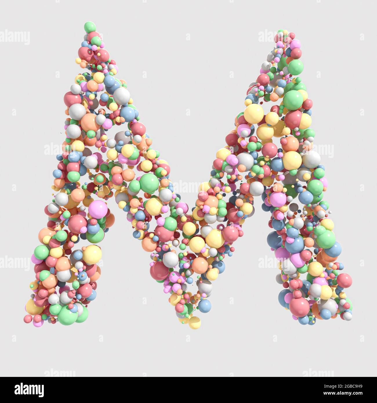 A concept letter M made up of a collection of round pastel colorful ...