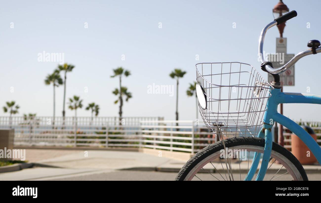 Blue bicycle, cruiser bike by ocean beach, pacific coast, Oceanside ...