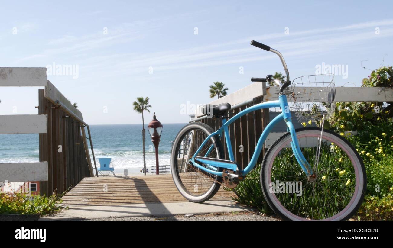 Blue bicycle, cruiser bike by ocean beach, pacific coast, Oceanside ...