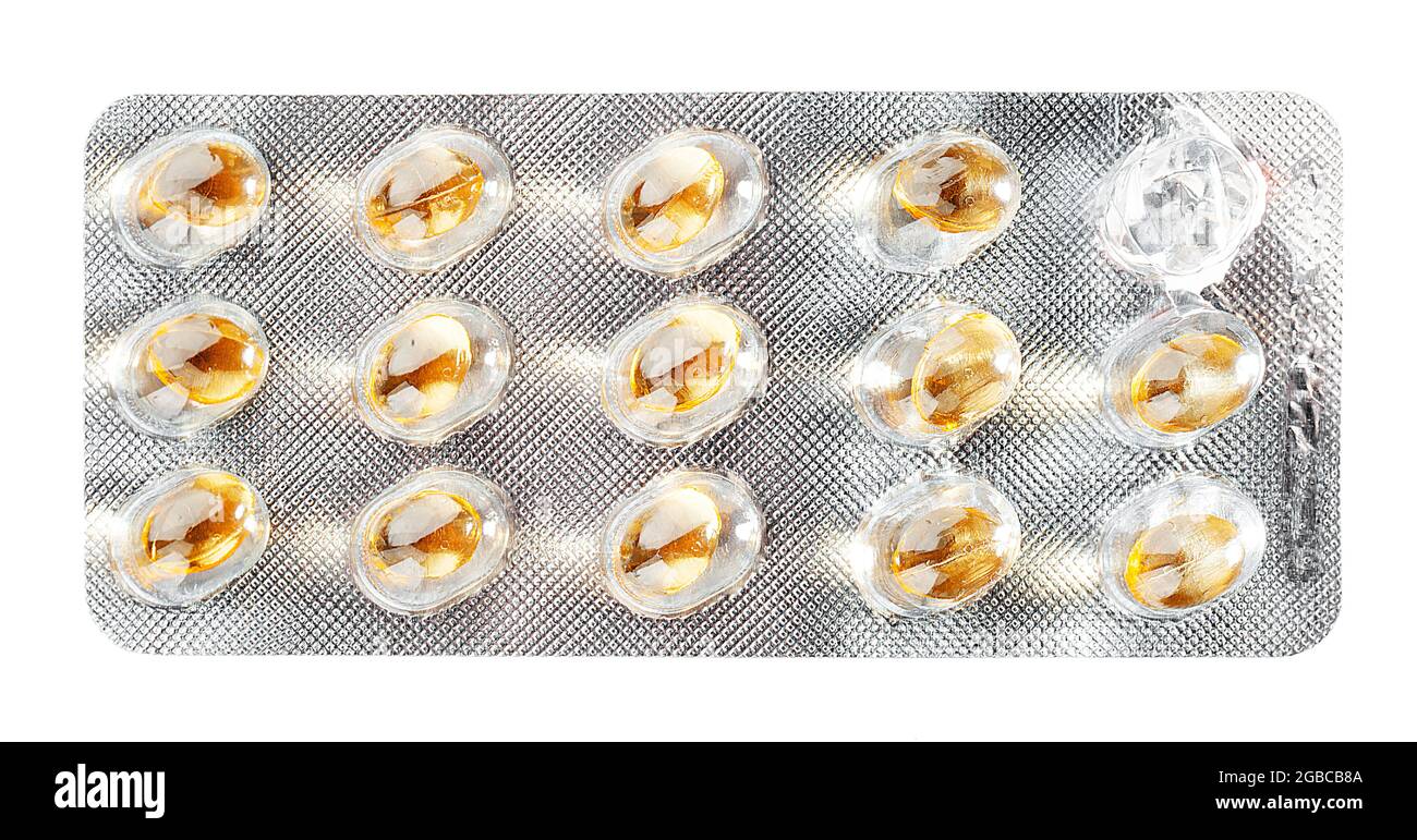Silver blister packs pills isolated on white Stock Photo - Alamy