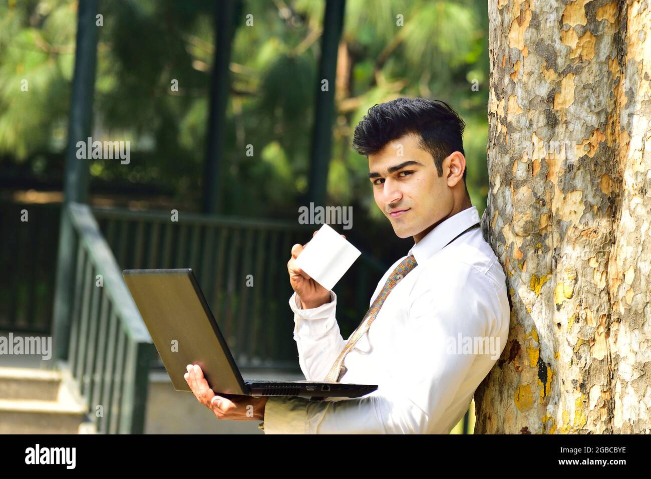Indian man coffee, laptop hi-res stock photography and images - Alamy