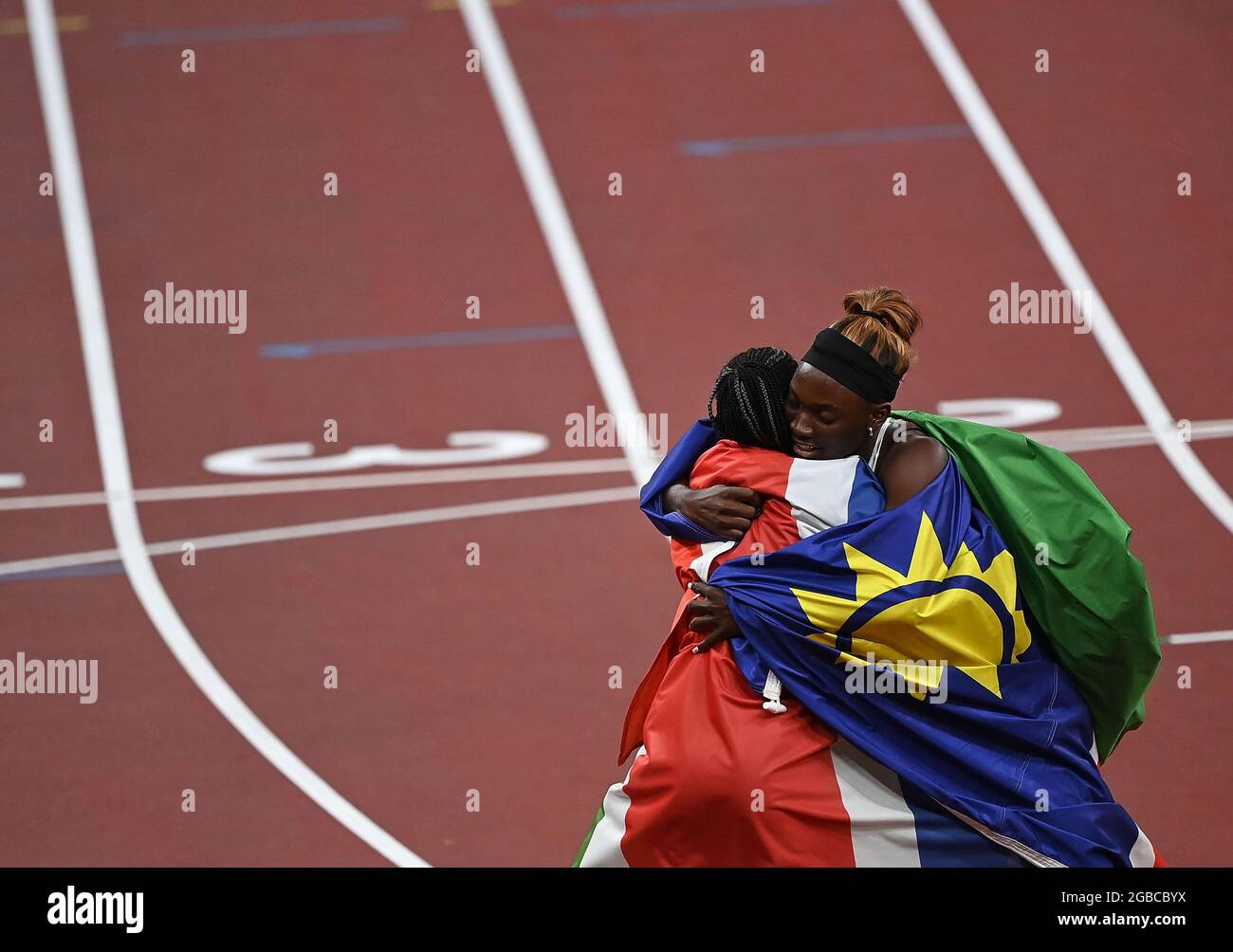 Tokyo, Japan. 3rd Aug, 2021. Christine Mboma (L) celebrates with ...
