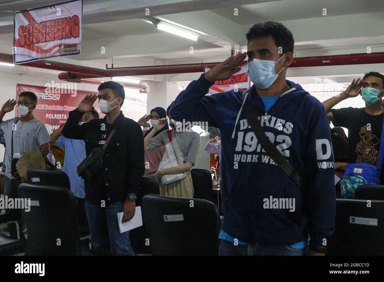 The Bogor City Police held a flag-raising ceremony and sang the ...