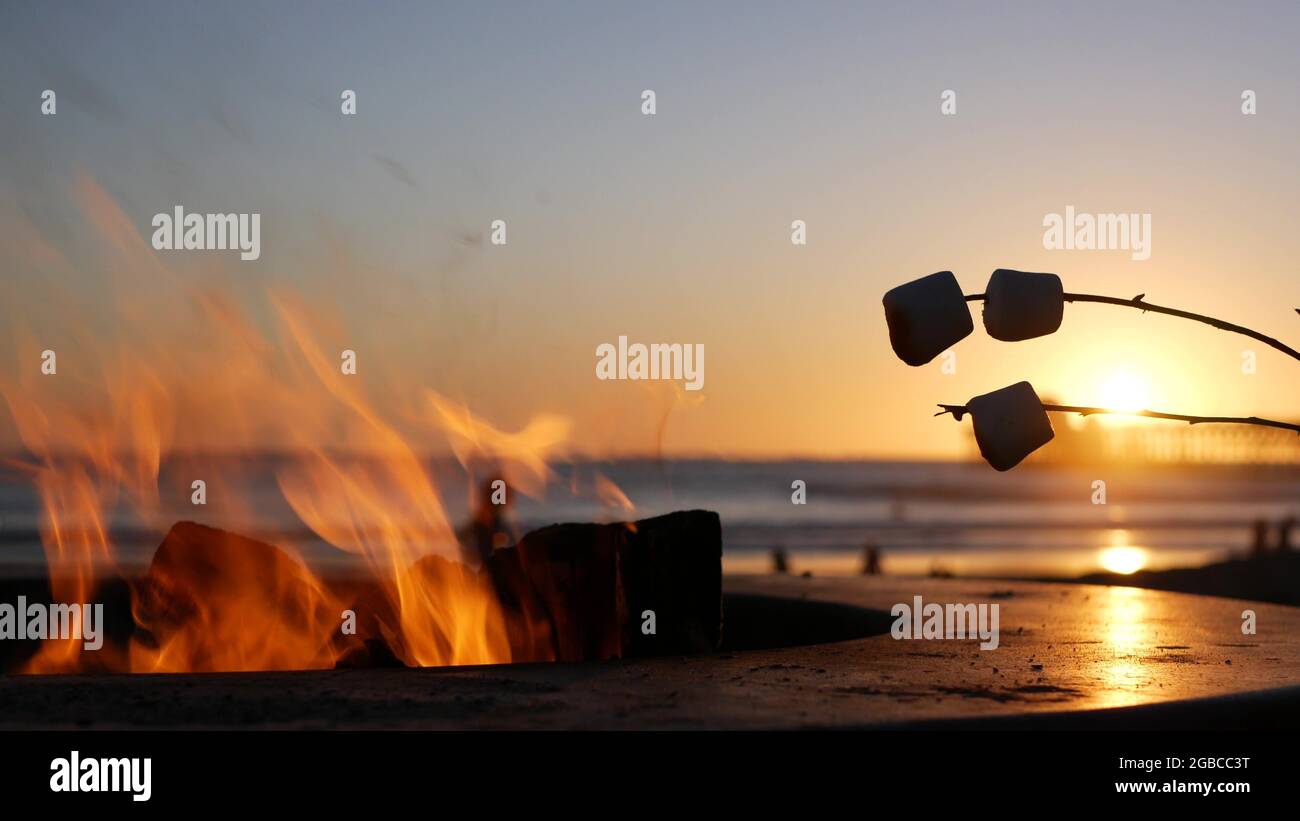 Campfire pit by Oceanside pier, California USA. Camp fire on ocean ...