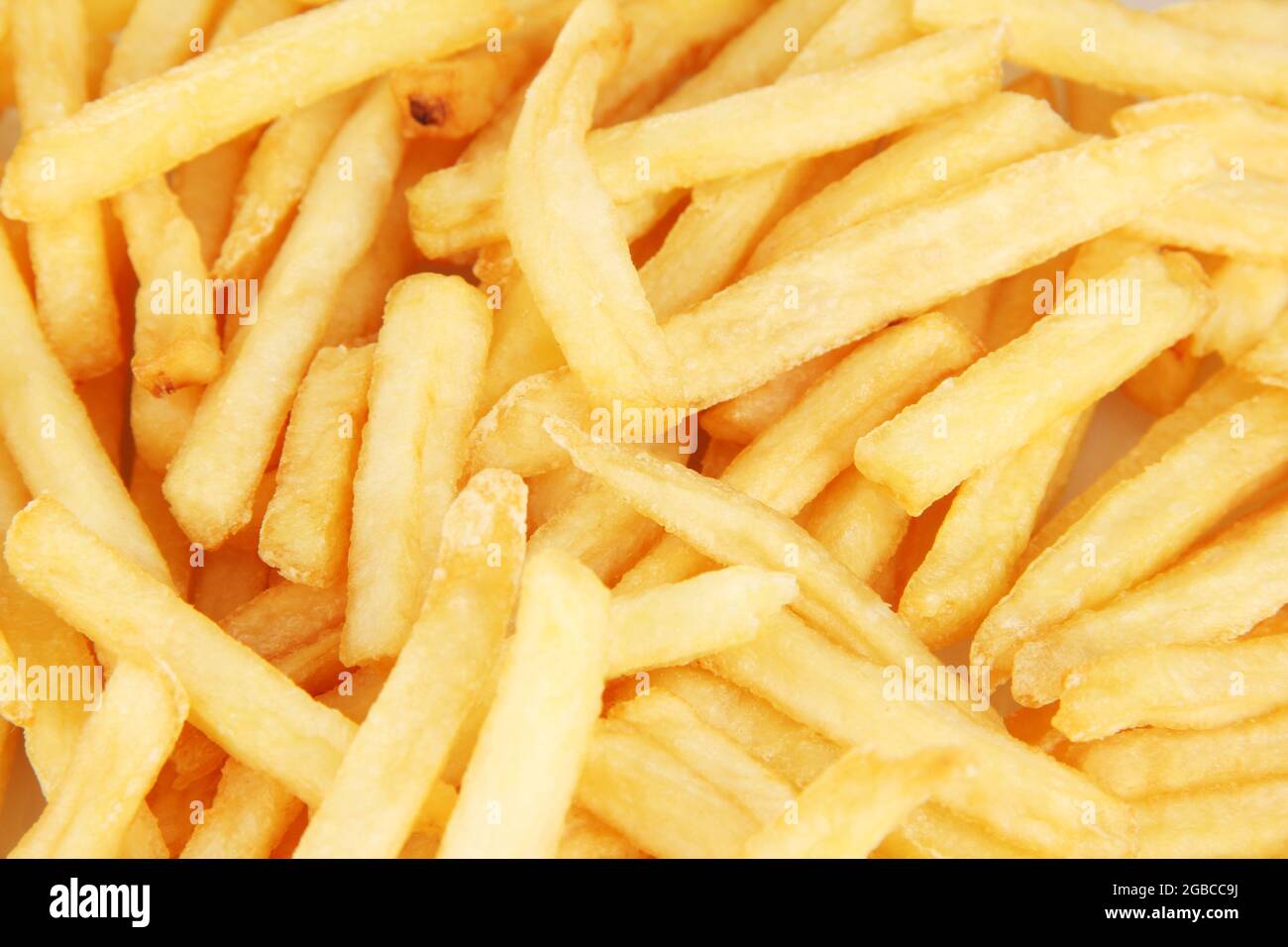 Potatoes fries background Stock Photo - Alamy