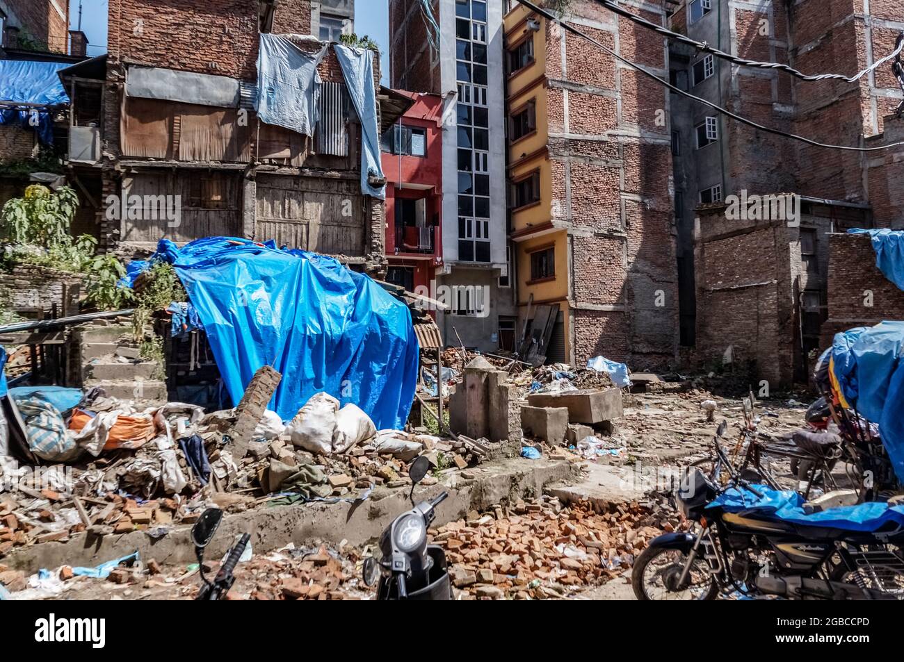 Clearing of debris from brick buildings collapsed after the April 2015 ...