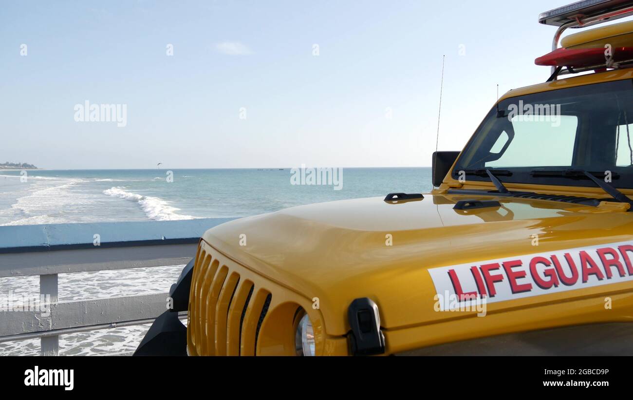 Yellow lifeguard car, San Clemente beach pier, California USA ...