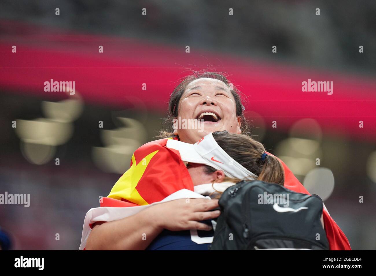 Tokyo, Japan. 3rd Aug, 2021. Wang Zheng (back) of China celebrates with ...