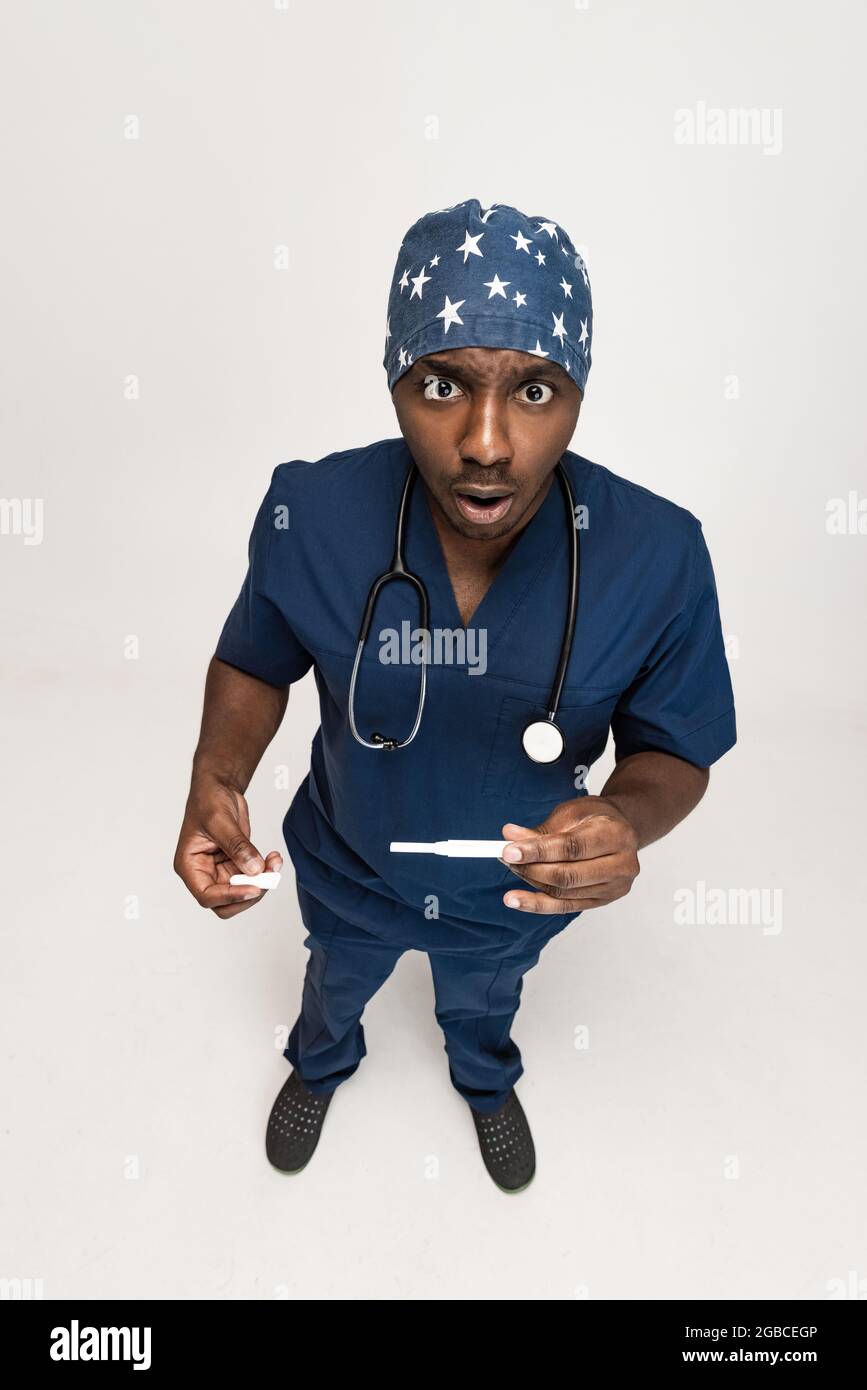 High angle view of african young doctor, therapeutic or medical advisor ...