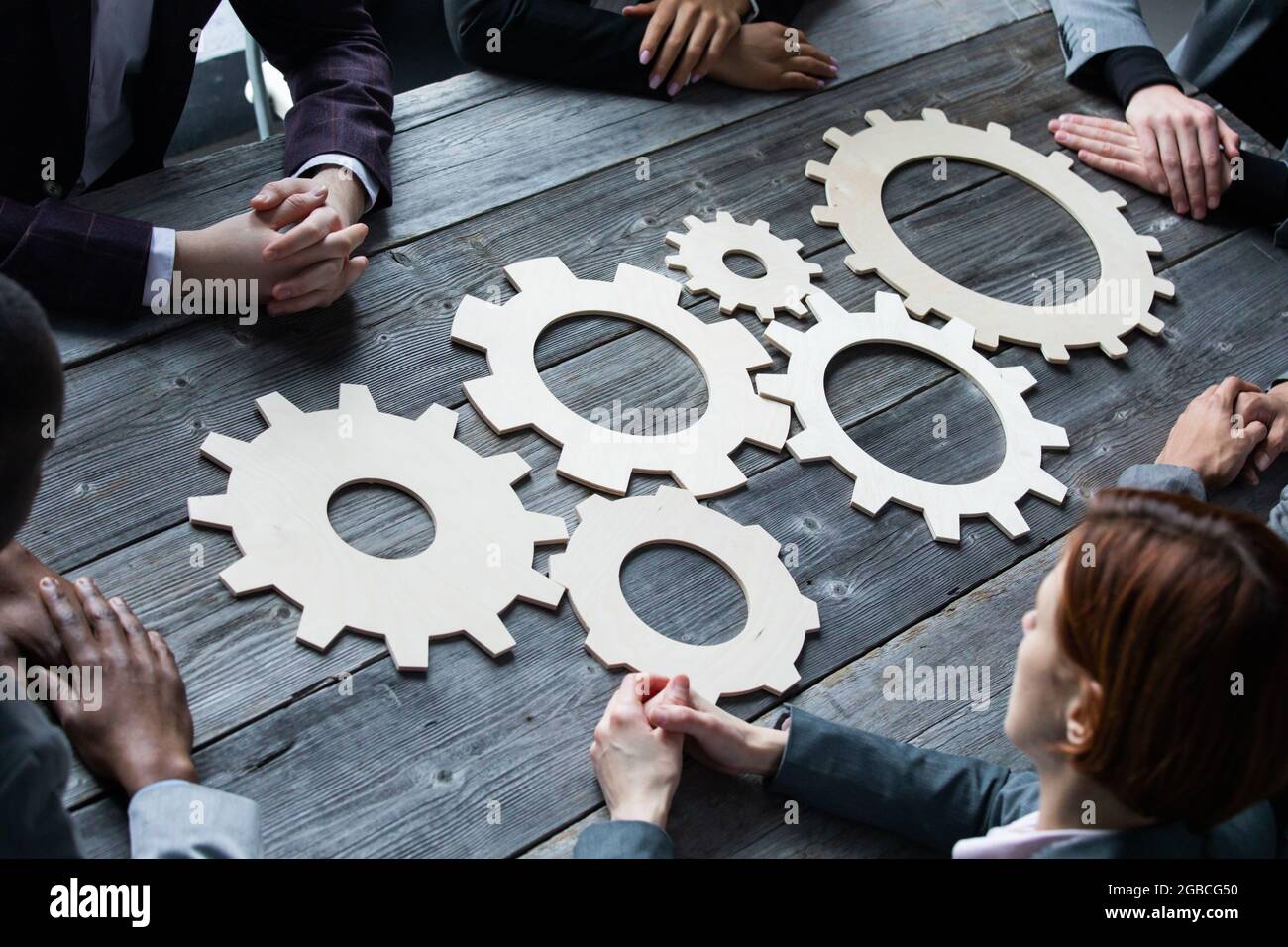 Men gear teamwork corporate business hi-res stock photography and ...