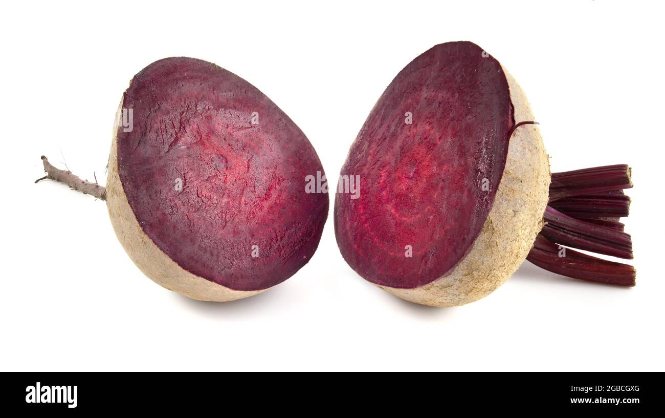 Red table beets in section isolated on white background Stock Photo - Alamy