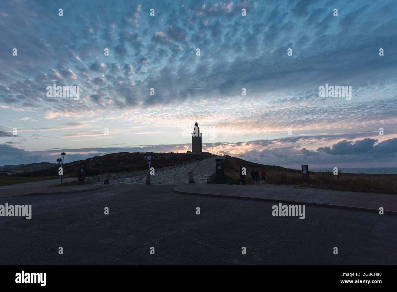 Tower of Hecules at sunset, the oldest Roman lighthouse in the world in ...