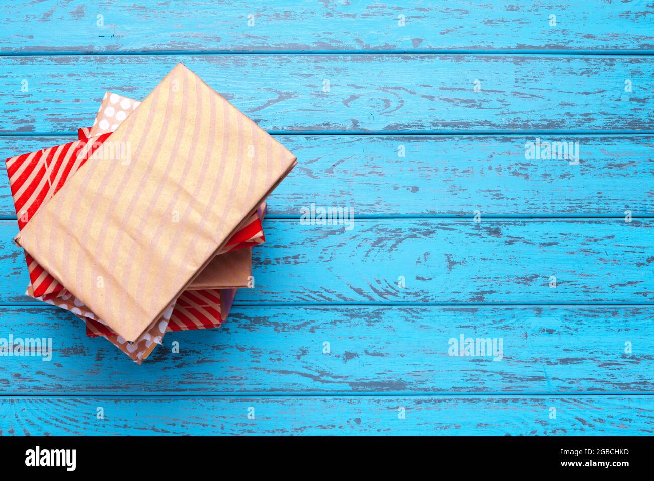 books on blue wooden background Stock Photo - Alamy