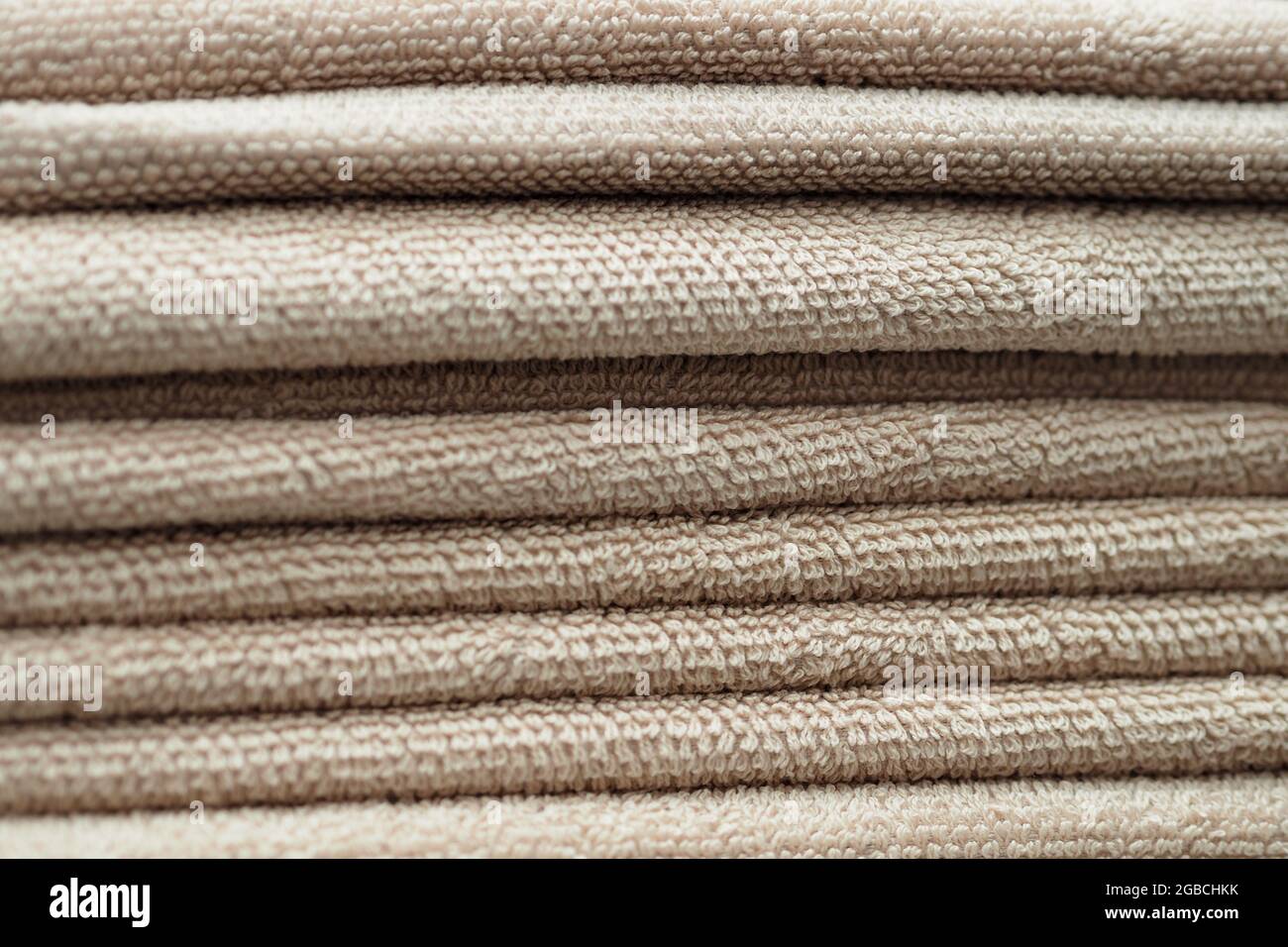 A terry towel. Home textiles on the shelf in the store. Full frame ...