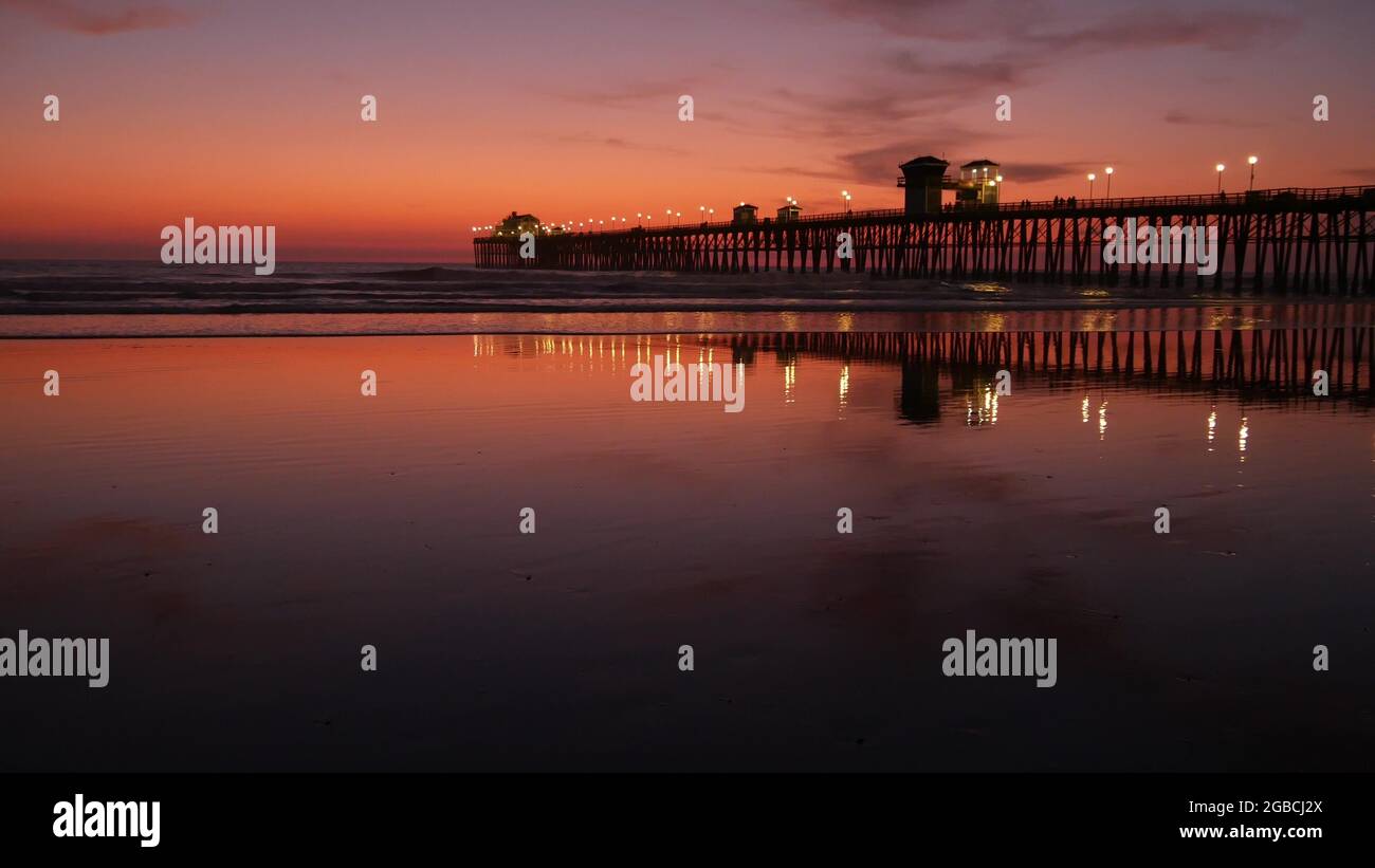 Pier silhouette Oceanside California USA. Pacific ocean tide tropical ...