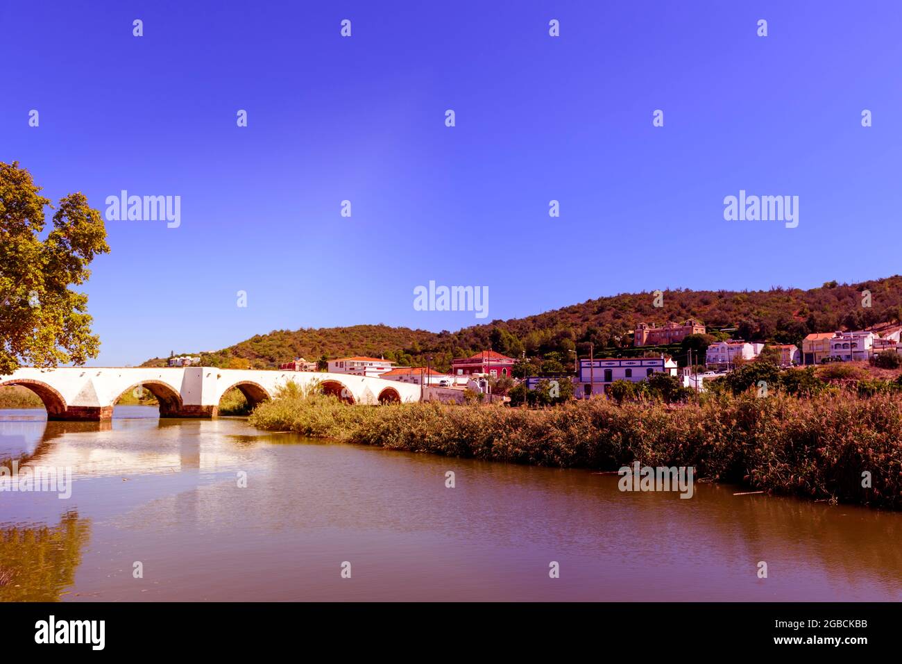 The roman bridge, ponte romana across the river Arade at Silves Algarve ...