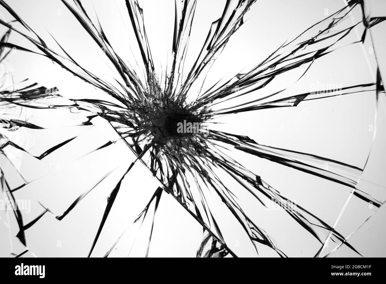Crack lines of broken glass. The texture of the impact and the ...
