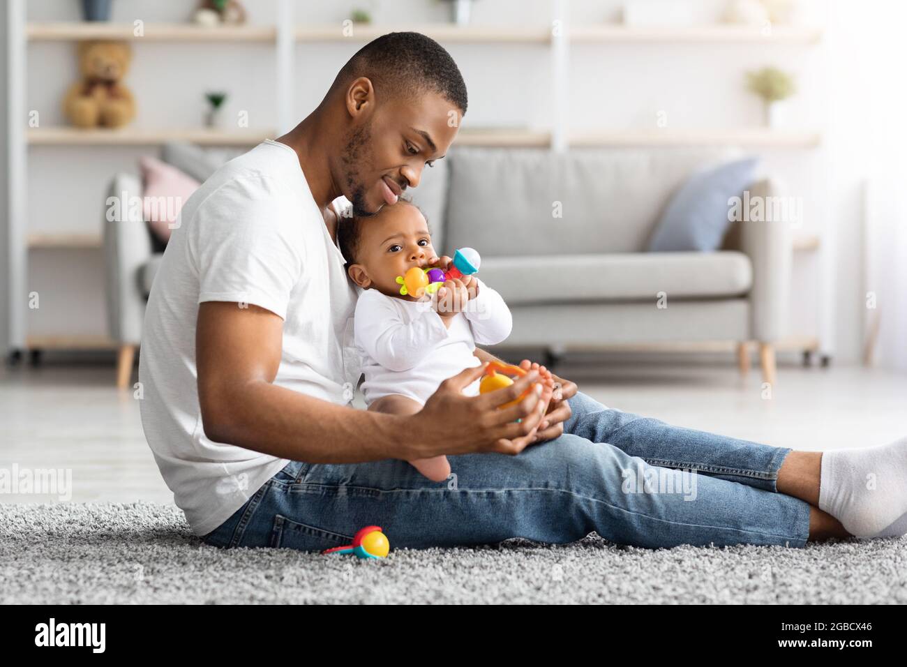 Paternity Time. Loving Young African-American Father Playing With ...