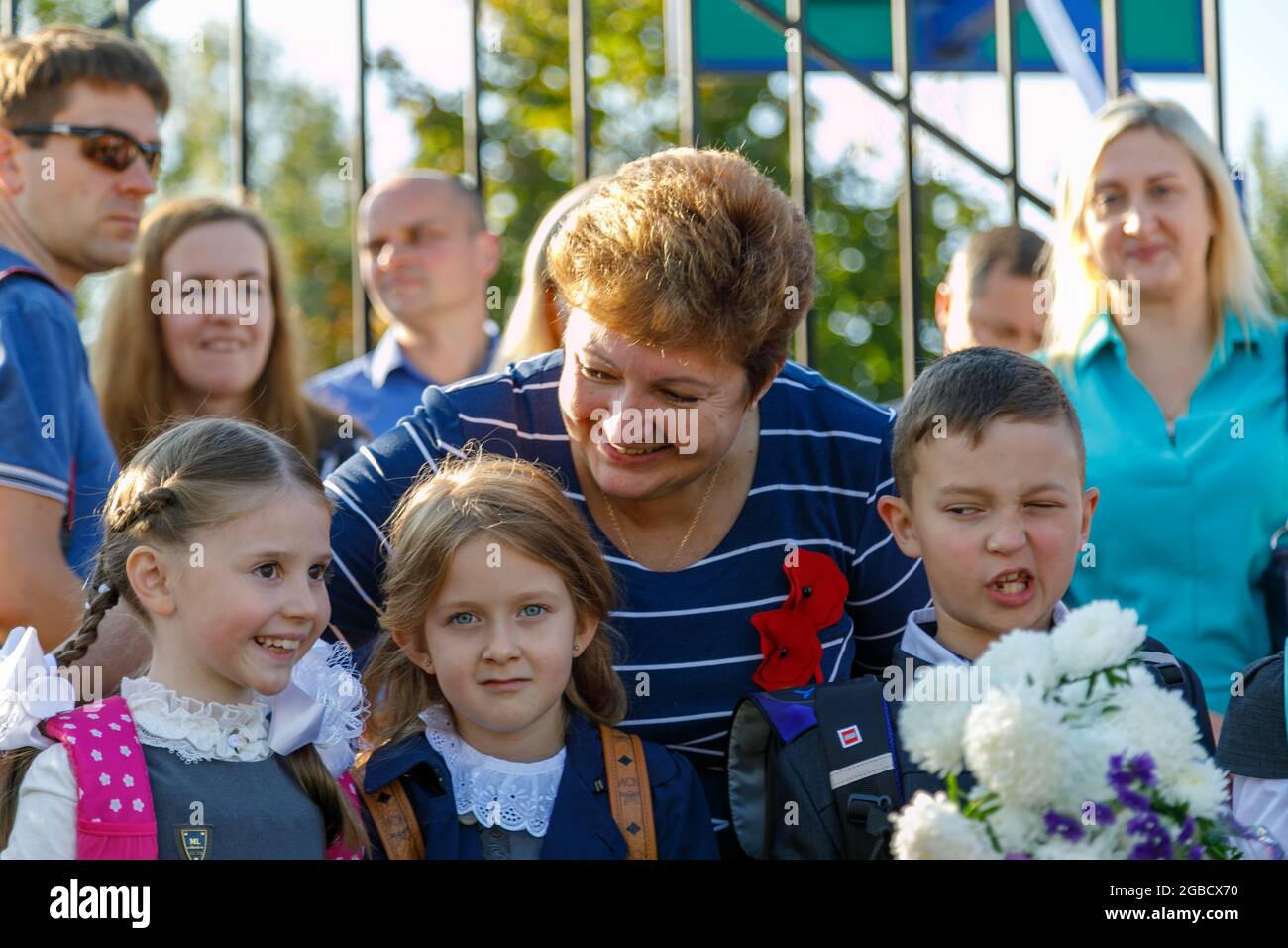 First graders celebrate the start of the school year on September 1st ...