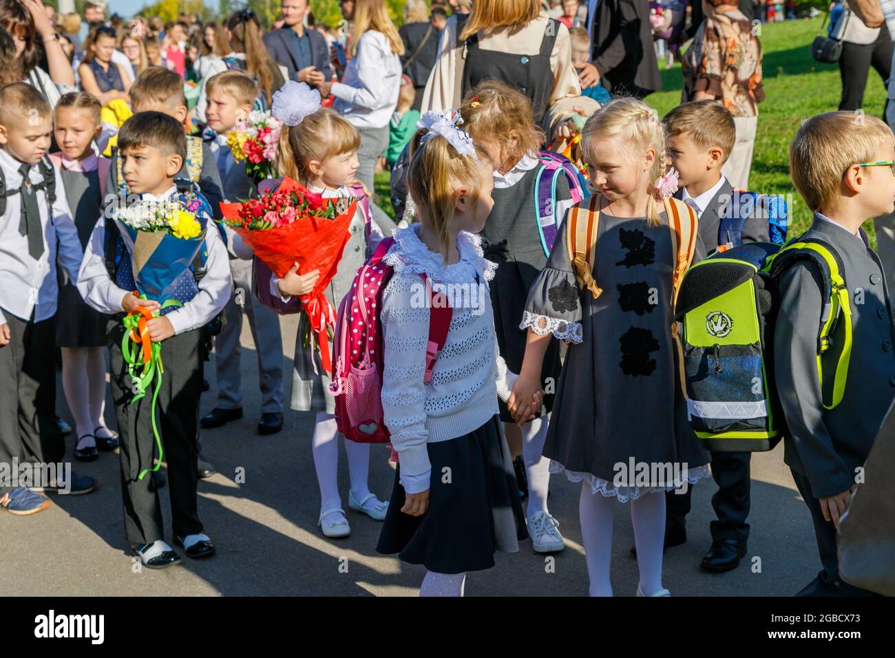 First graders celebrate the start of the school year on September 1st ...