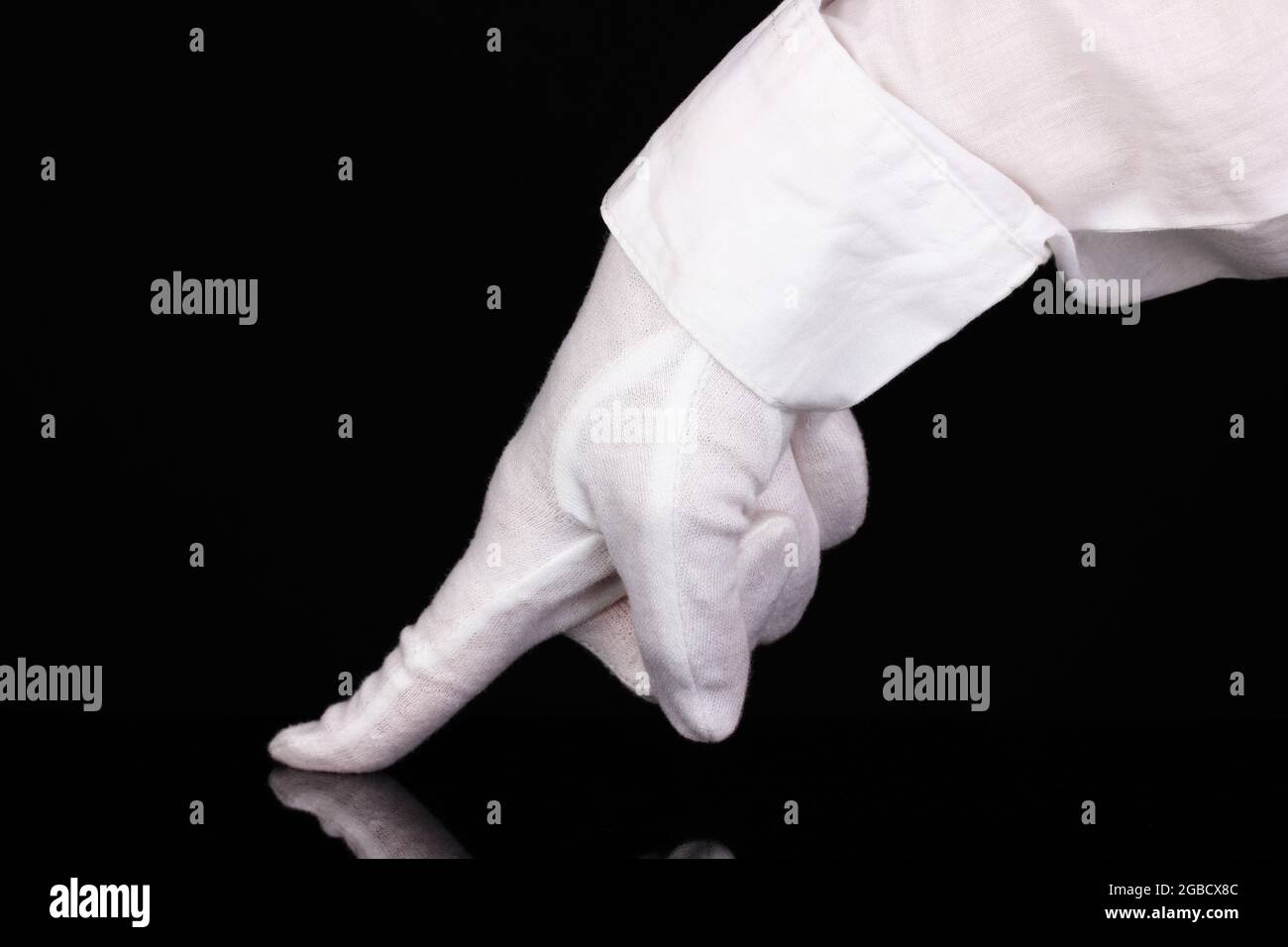 Female hand checking cleanliness isolated on black Stock Photo - Alamy