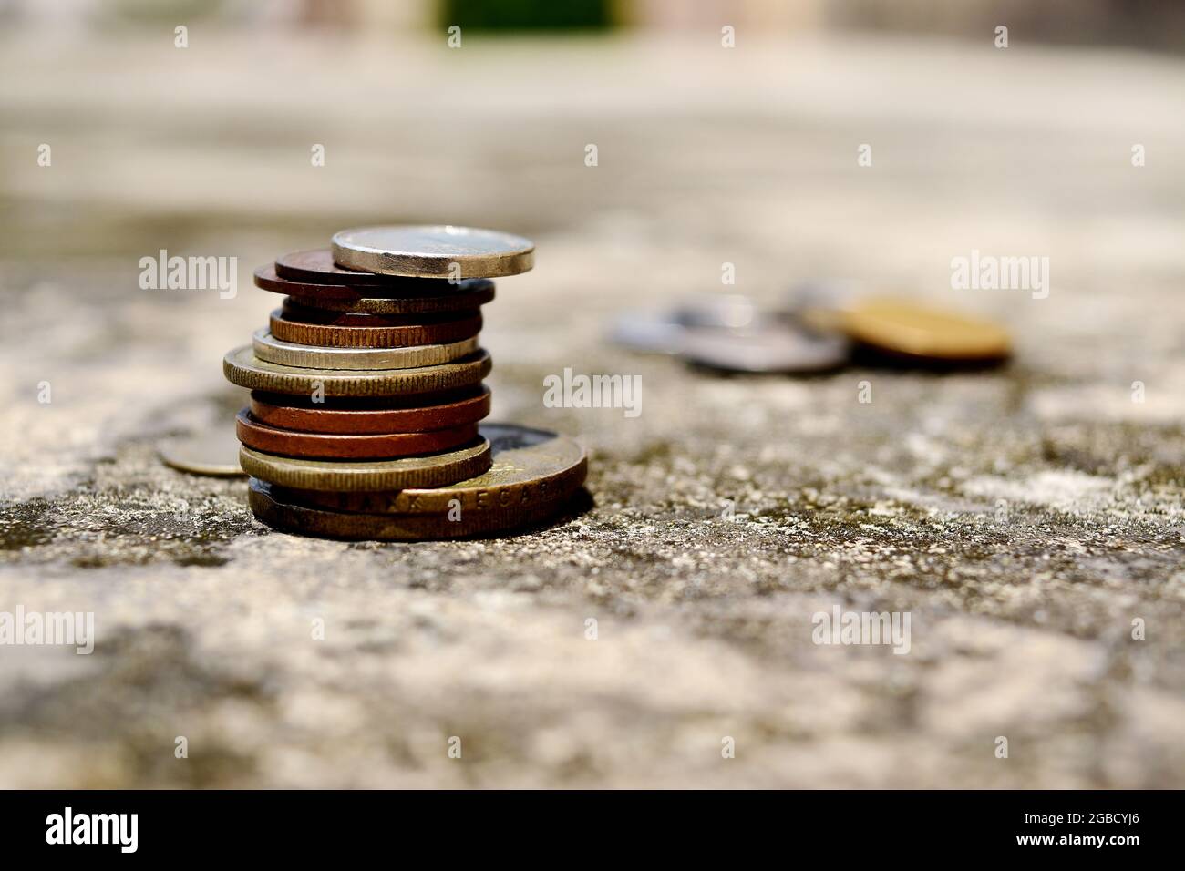coins stacked on each other in different positions. money concept Stock ...