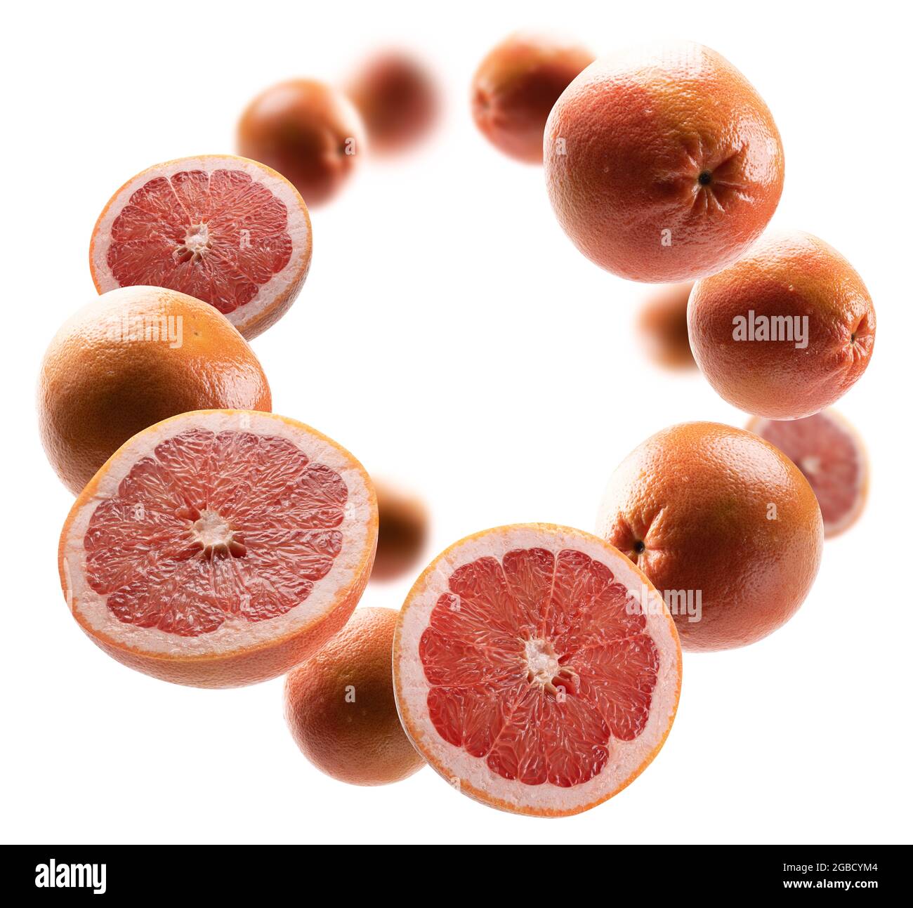 Whole and cut grapefruits levitate on a white background Stock Photo ...