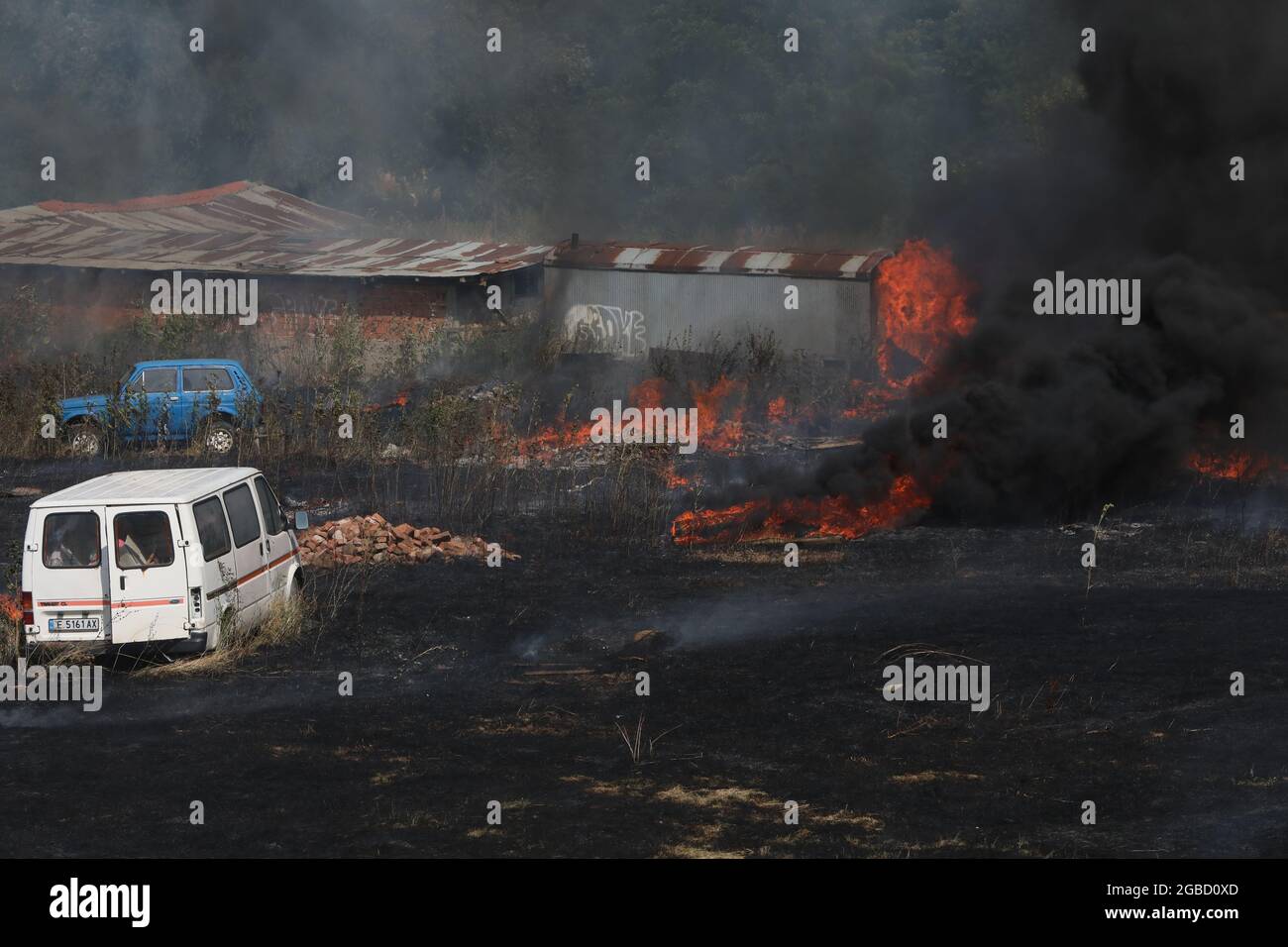 Sofia, Bulgaria - August 3, 2021: A team of firefighters extinguished a ...