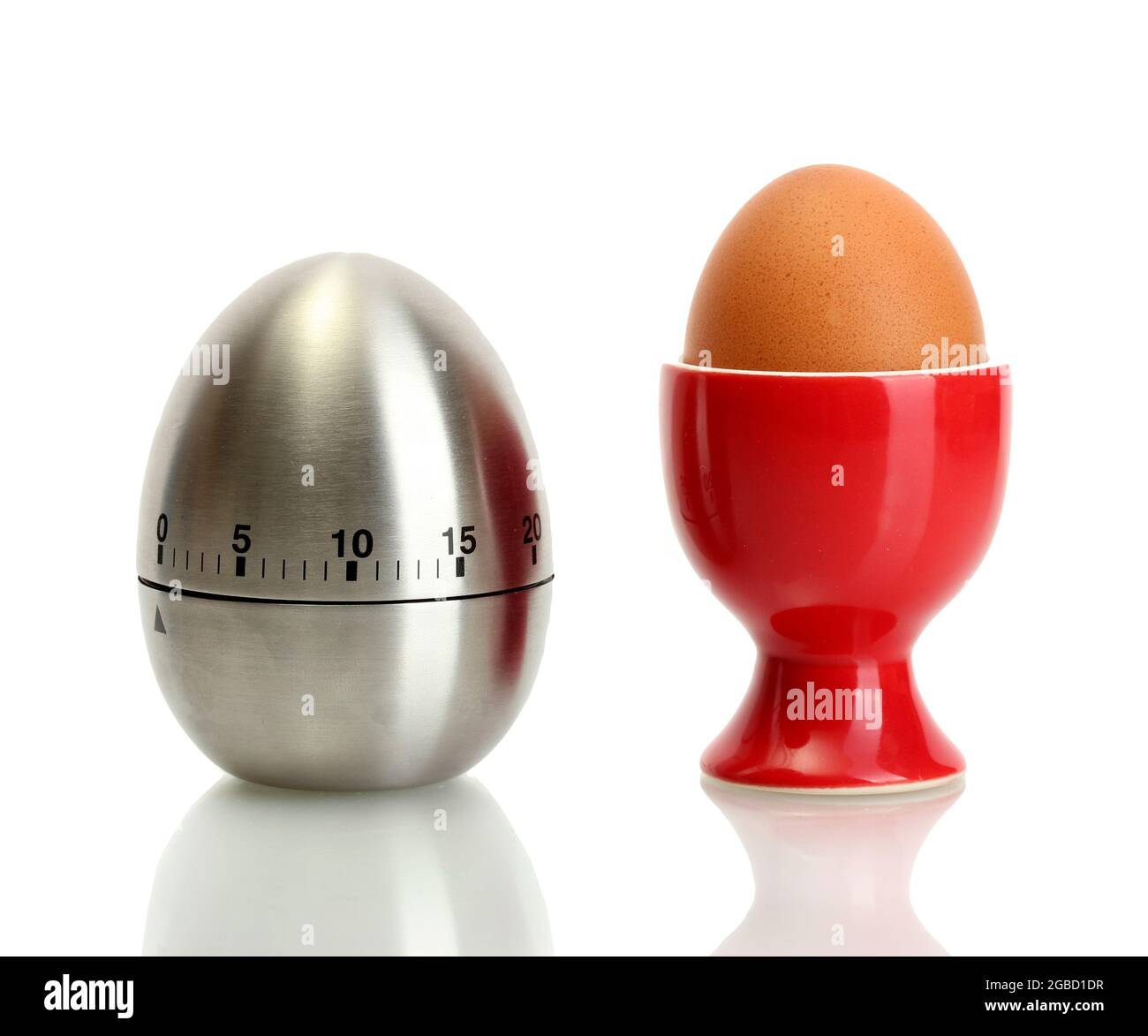 egg timer and egg in red stand isolated on white Stock Photo - Alamy