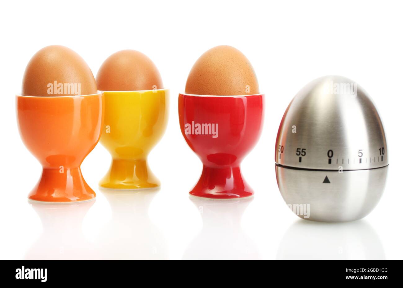egg timer and egg in color stand isolated on white Stock Photo - Alamy
