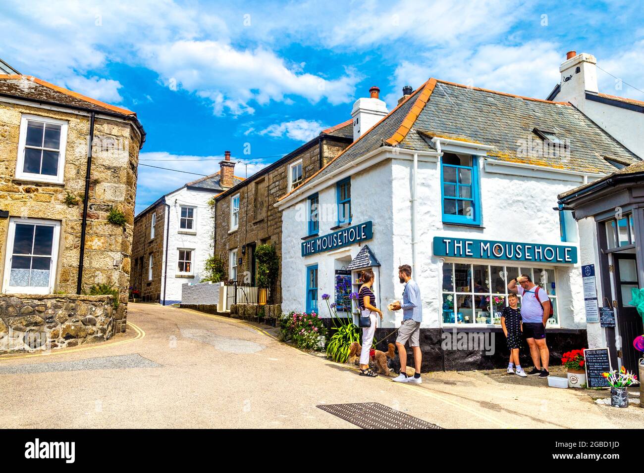 Shops in the fishing village of Mousehole, Penwith Peninsula, Cornwall ...