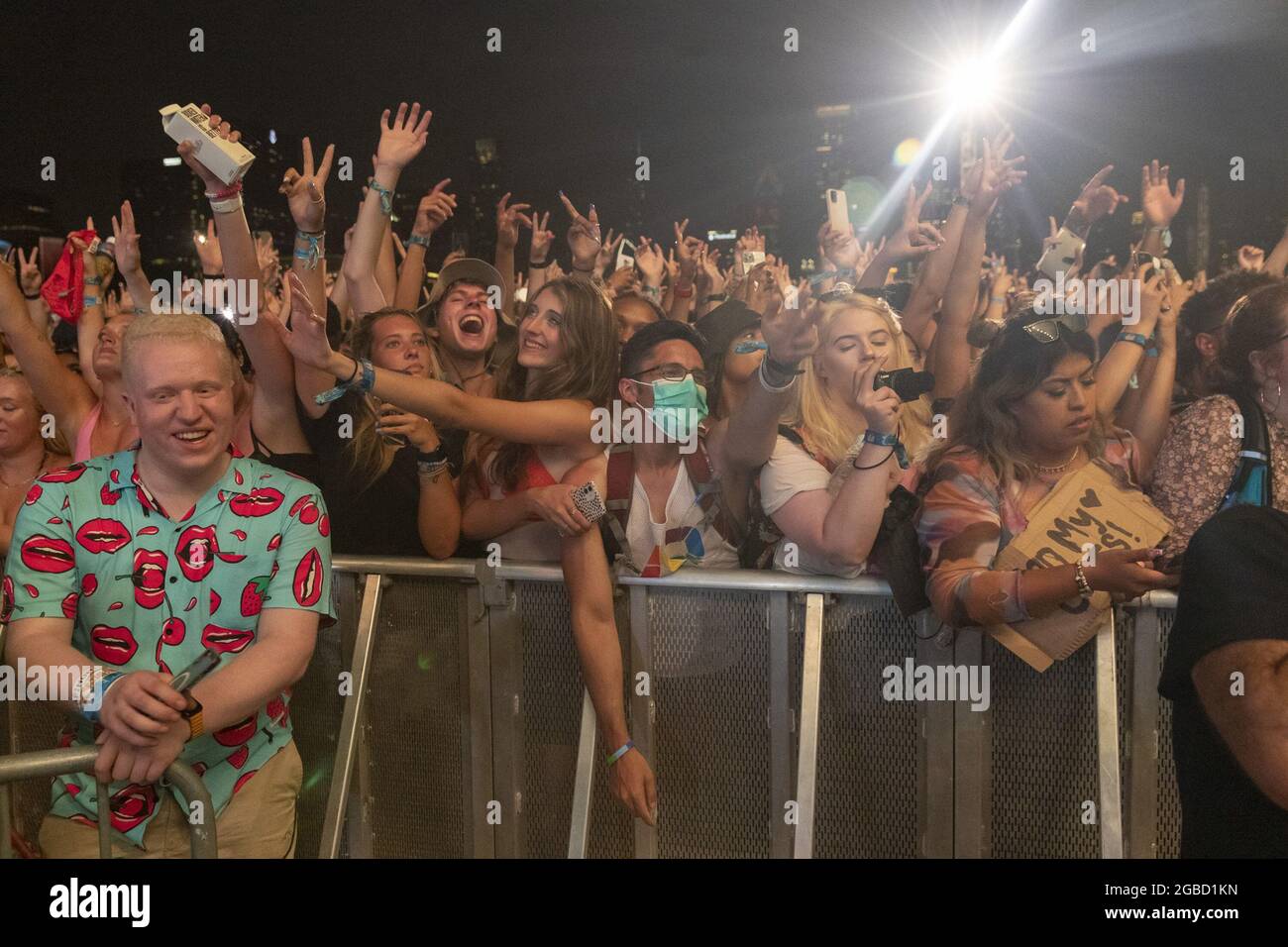 Festivalgoers cheer as Post Malone performs at the T-Mobile stage ...