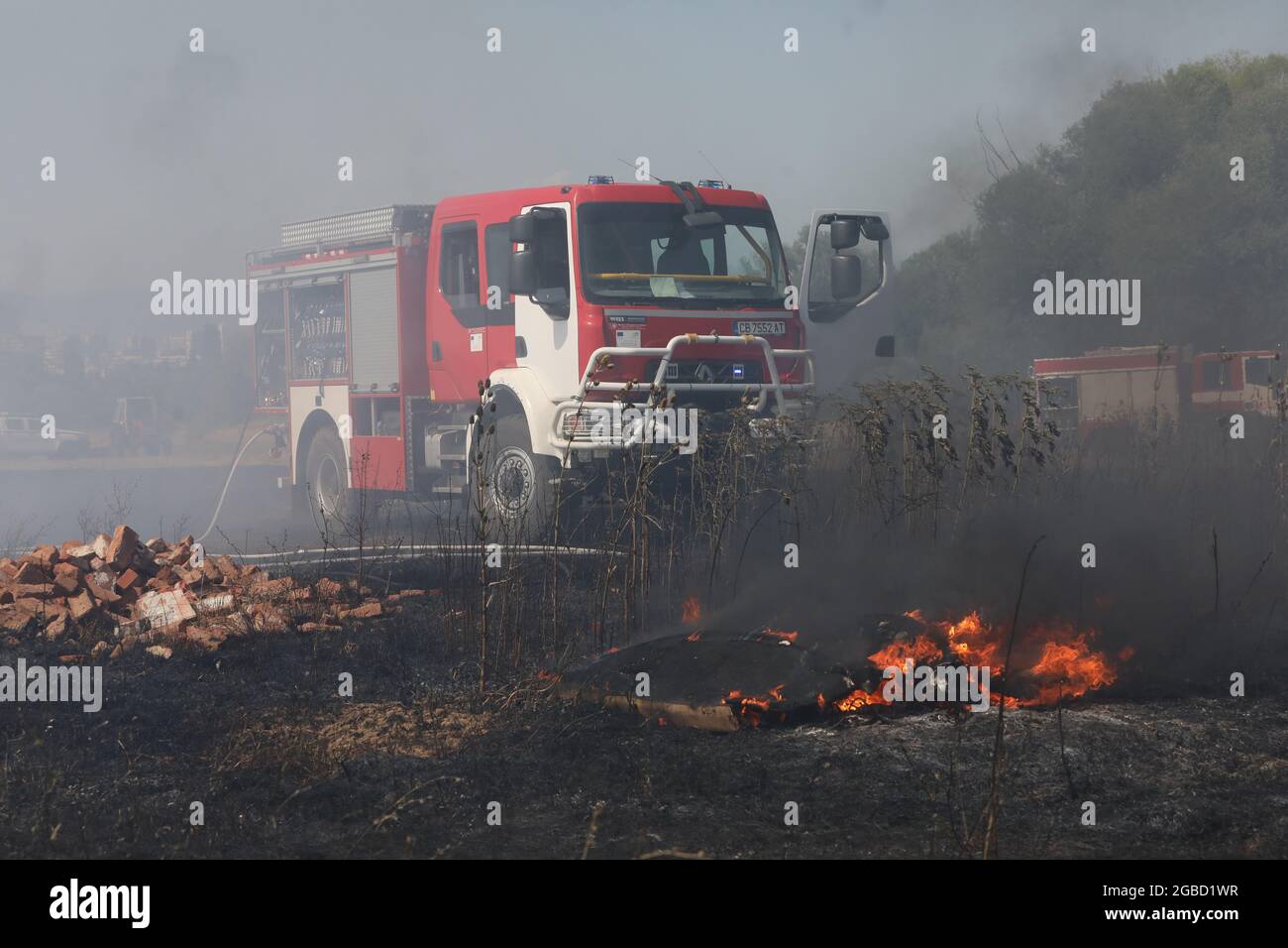 Sofia, Bulgaria - August 3, 2021: A team of firefighters extinguished a ...