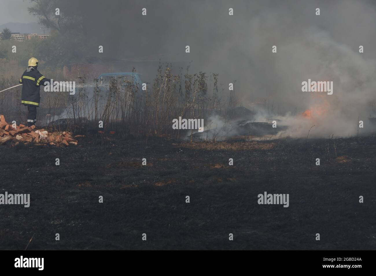 Sofia, Bulgaria - August 3, 2021: A team of firefighters extinguished a ...