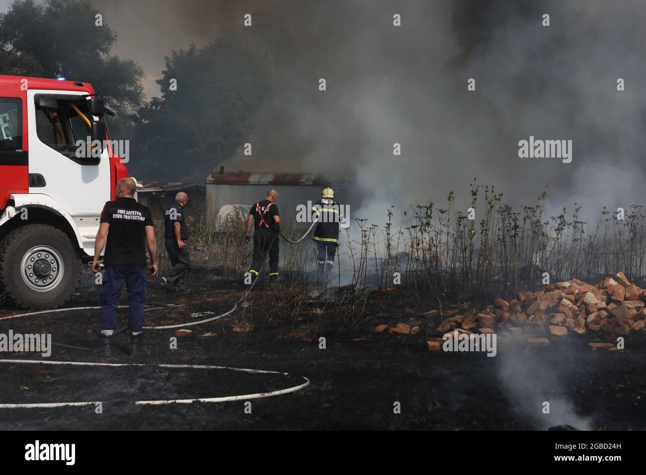 Sofia, Bulgaria - August 3, 2021: A team of firefighters extinguished a ...