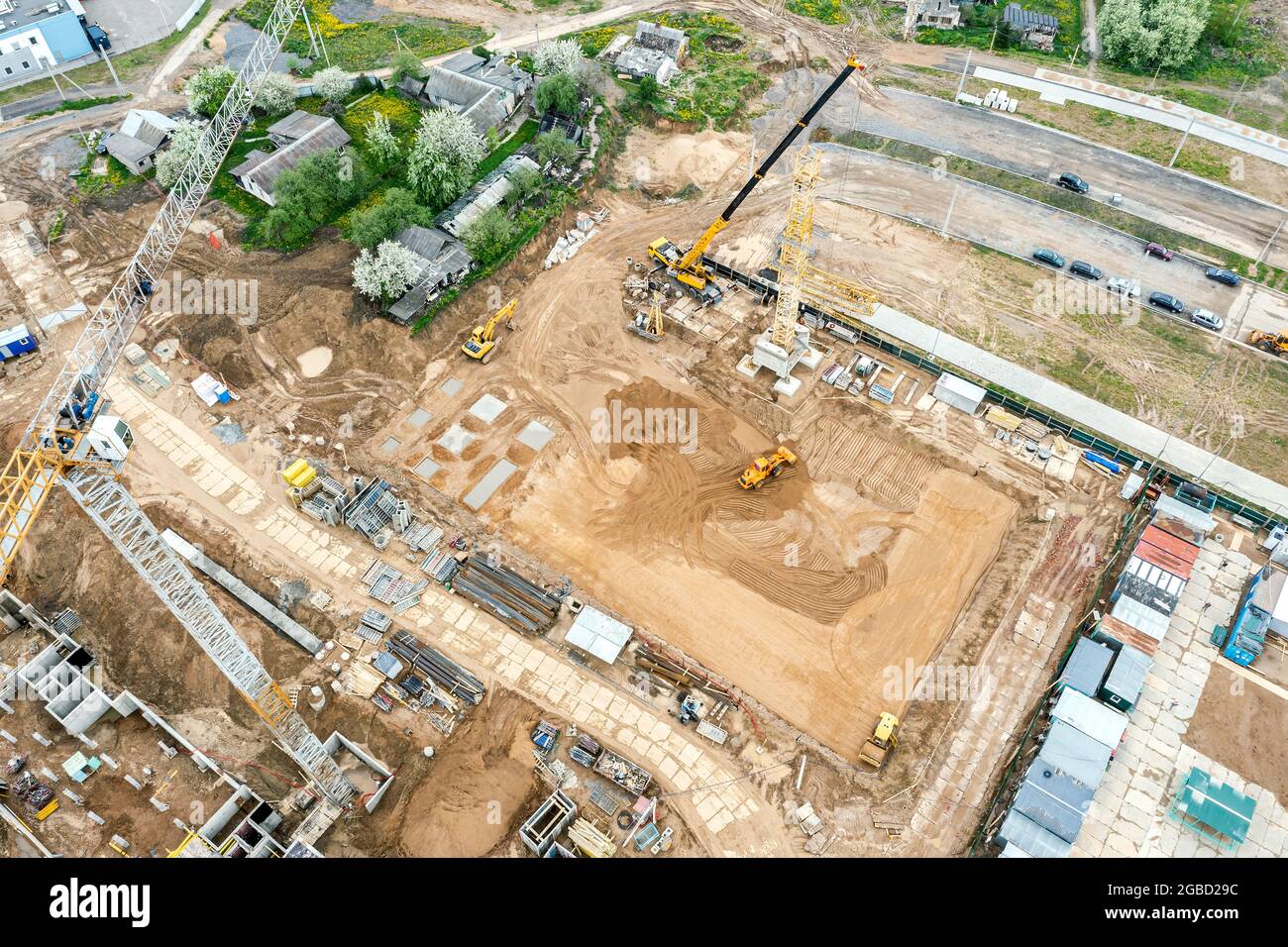 heavy industrial machines working on construction site. leveling and ...