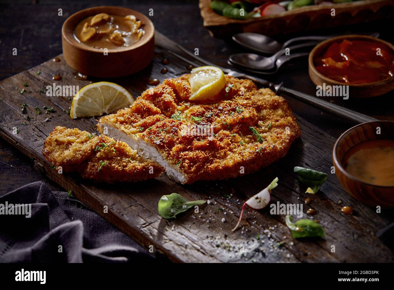 Breaded schnitzel on cutting hi-res stock photography and images - Alamy