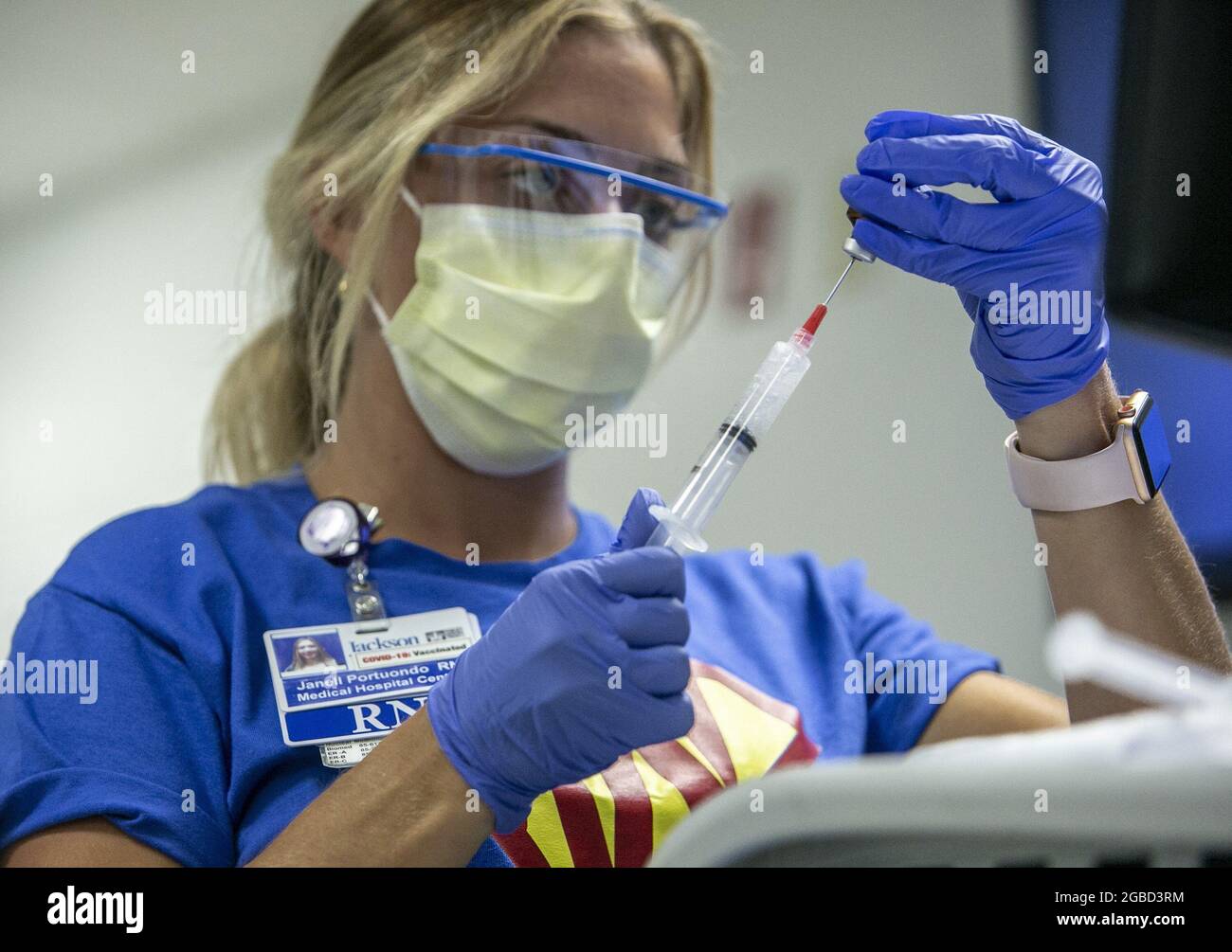 Miami, Florida, - A nurse prepares medication to be administered to a ...