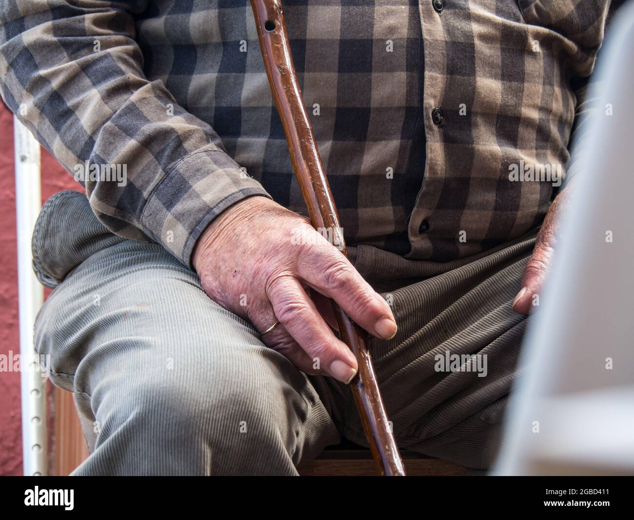 Old man with his wood stick Stock Photo - Alamy