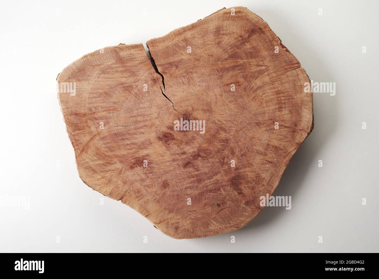 Top view of wood cross section of uneven shape with cracks for rustic ...