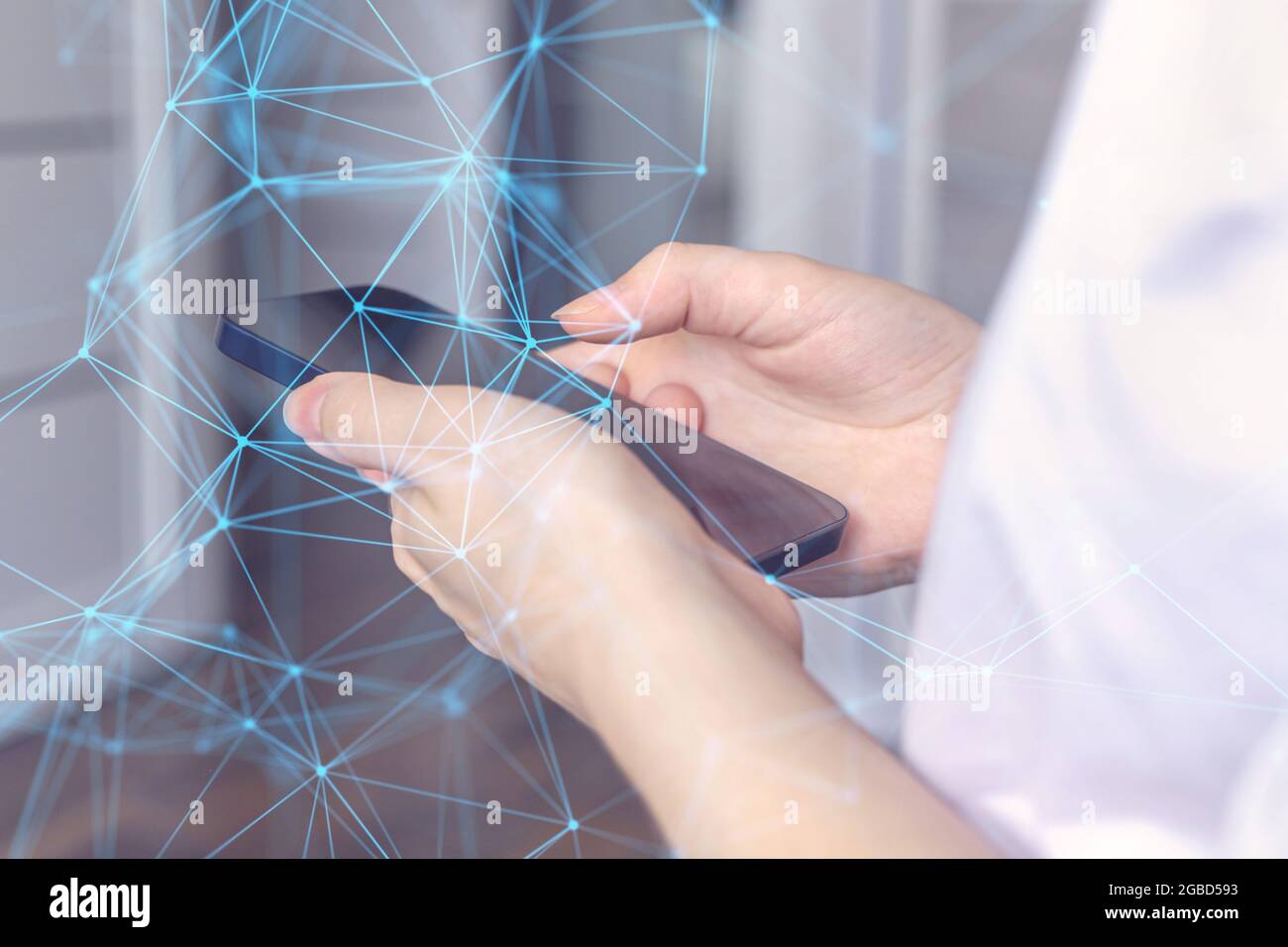 Technology networking concept, woman holding smartphone with abstract ...