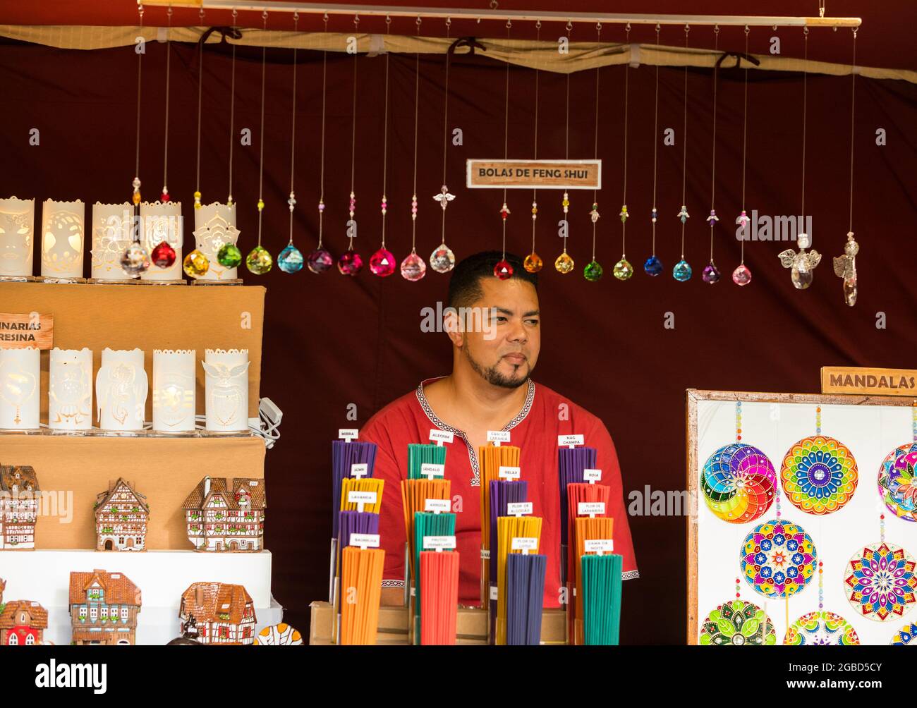03 August 2019, Male seller and his medieval shop tent in "Viagem ...