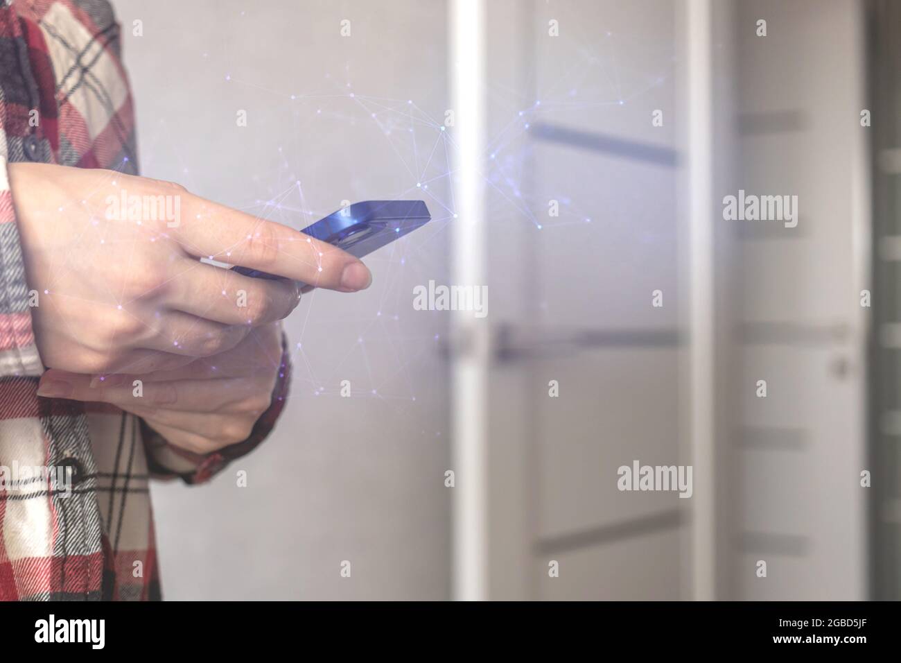 Techonoly networking concept, woman holding smartphone with abstract ...
